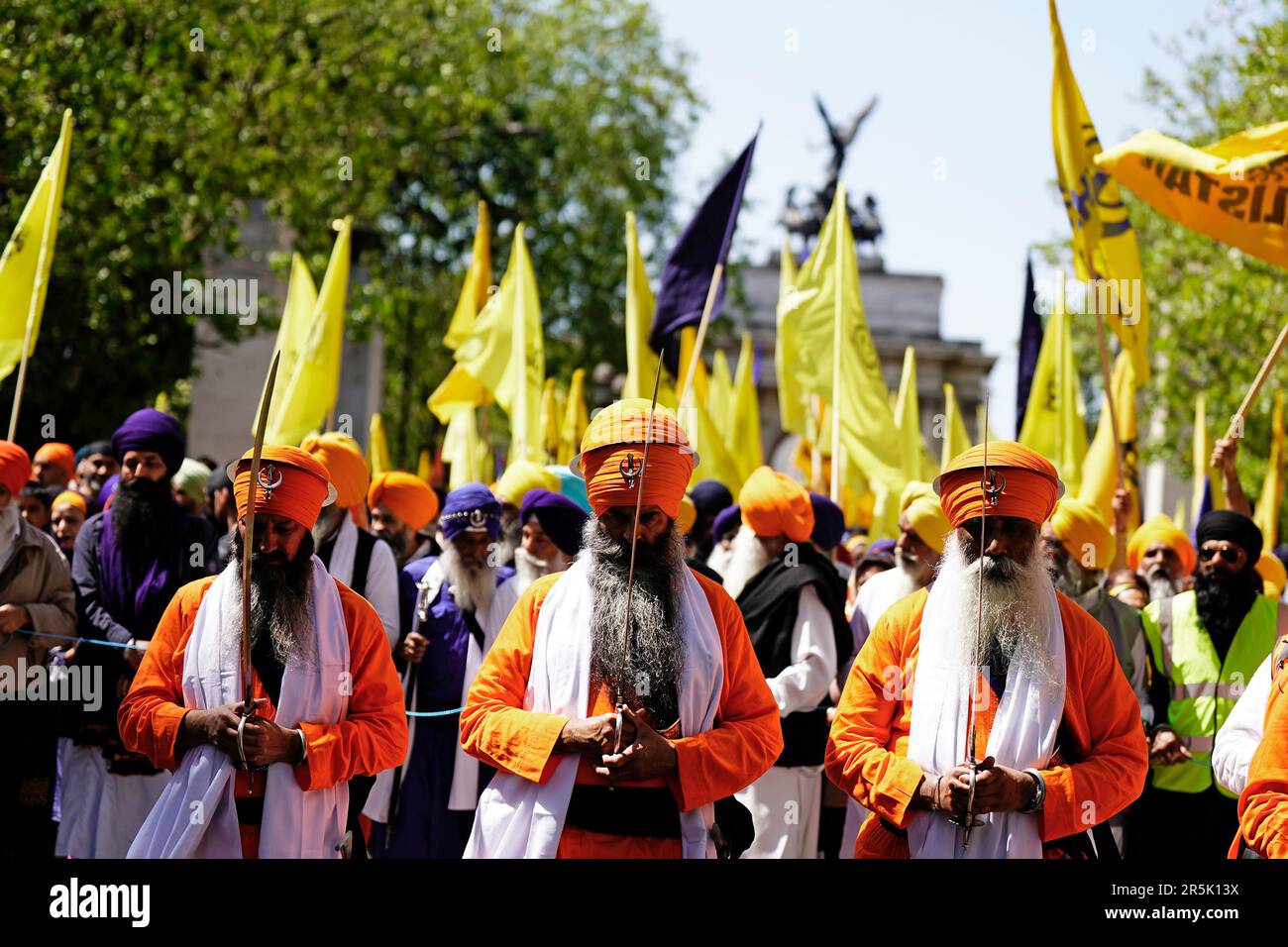 Members of the Sikh community from across the UK march to Trafalgar ...