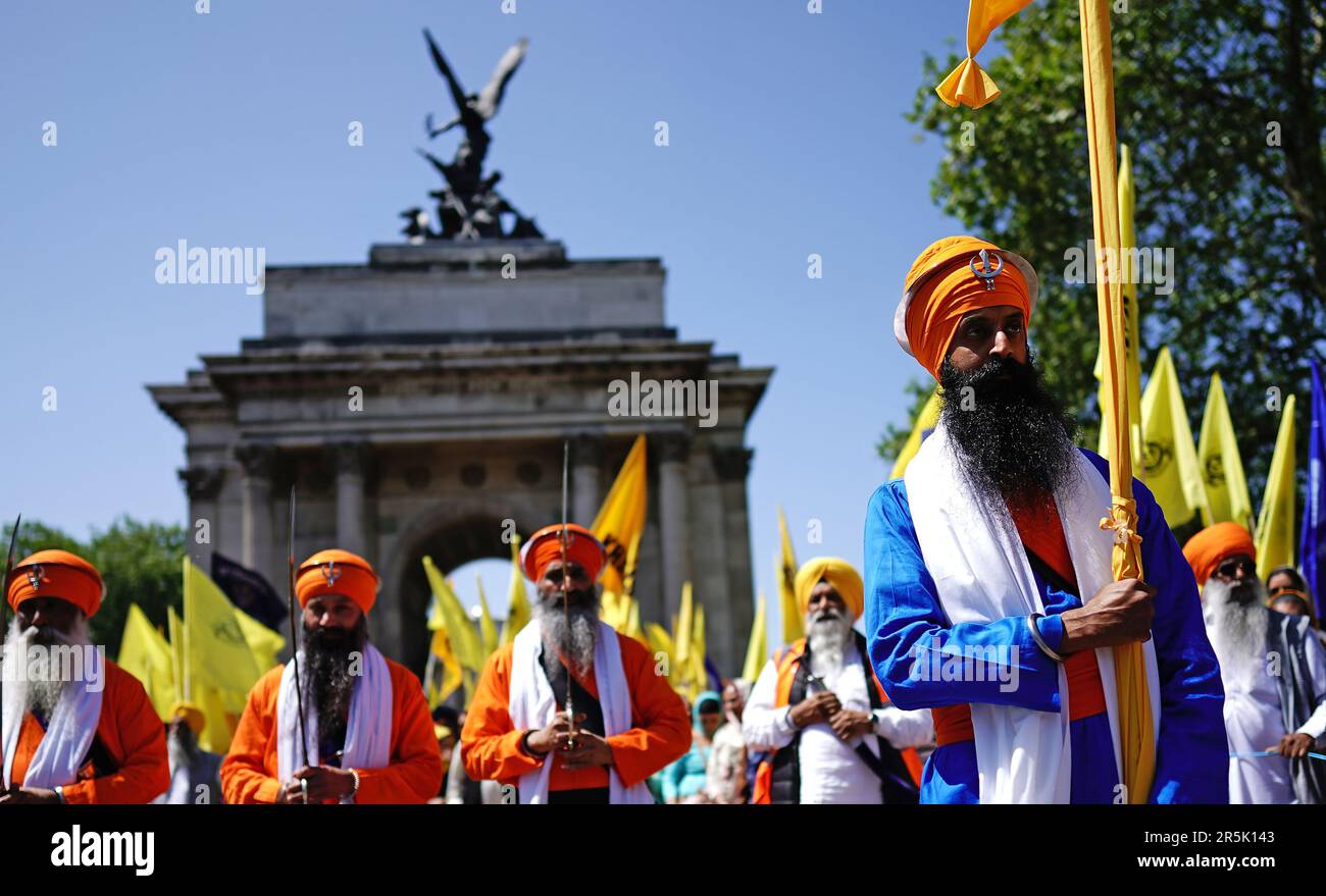 Members of the Sikh community from across the UK march to Trafalgar ...