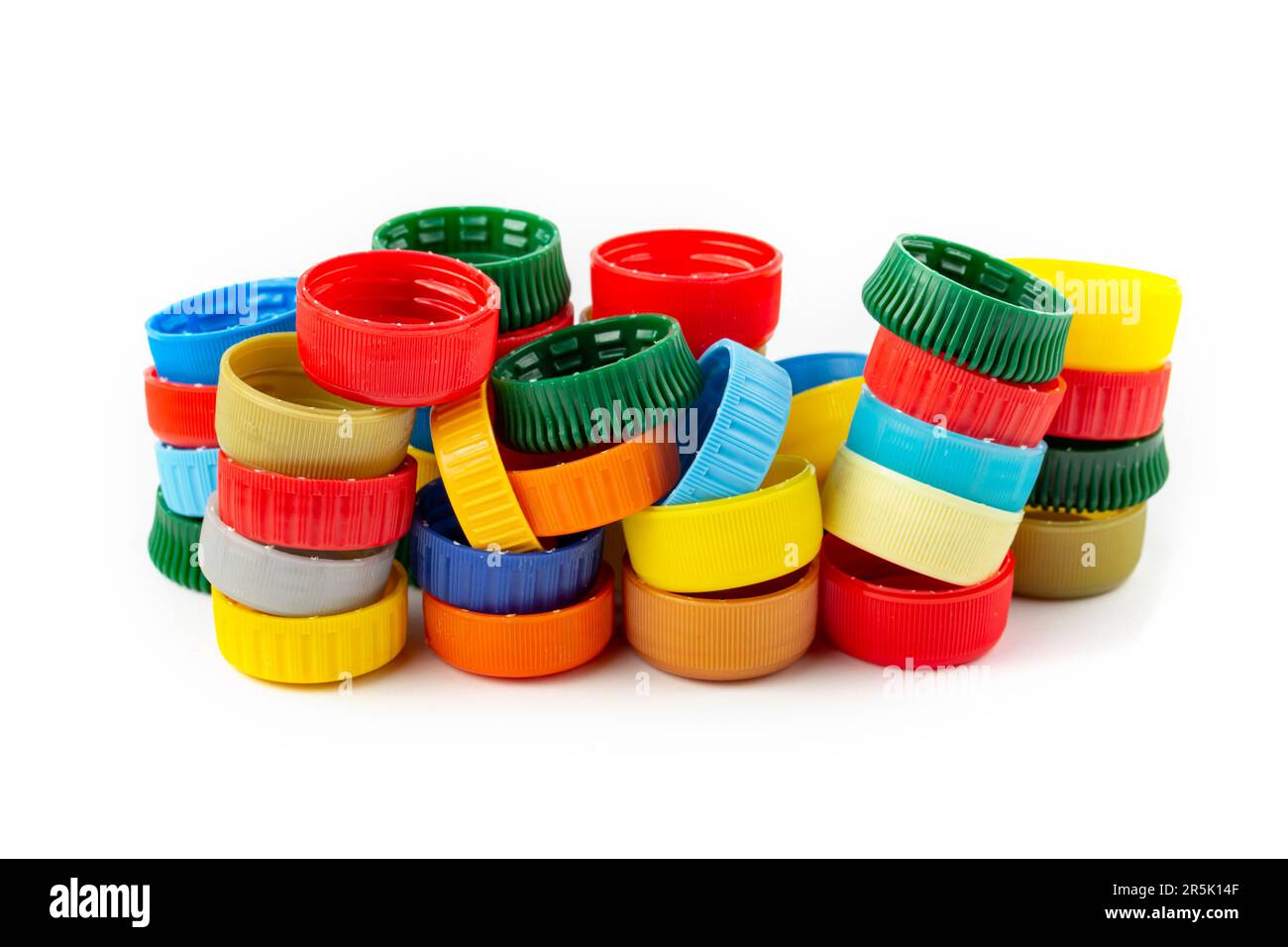 Сolorful plastic caps on white background, recycle for environment ...
