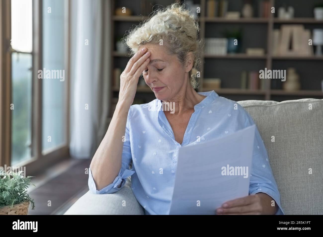 Upset senior elder woman shocked about health problems Stock Photo - Alamy