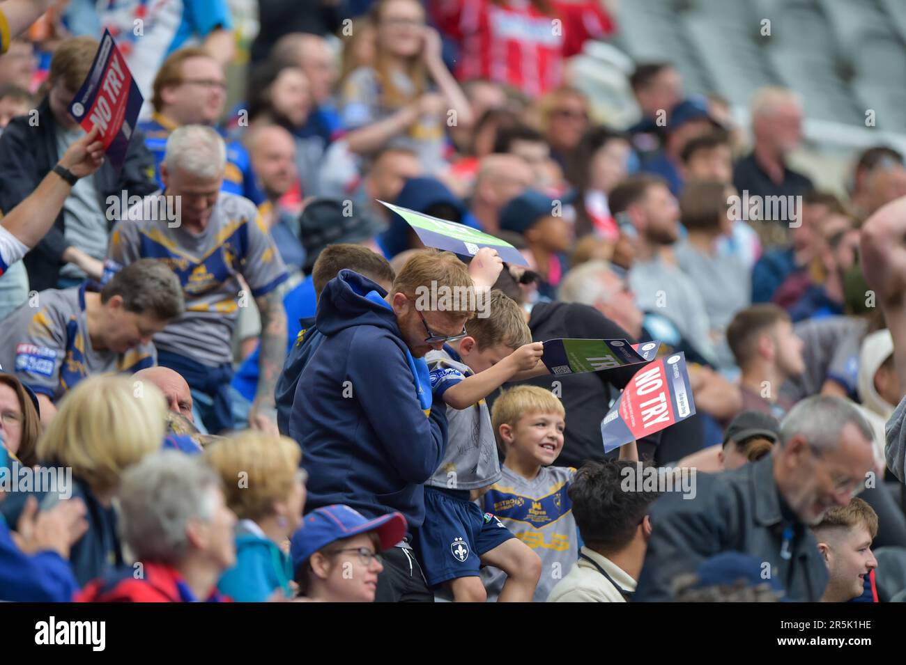 Young Wakefield fans celebrate a try during the Magic Weekend match ...