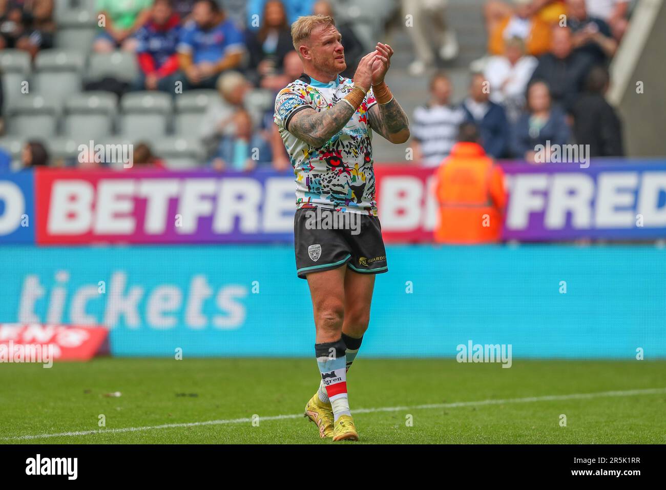 Oliver Holmes #16 of Leigh Leopards applauds the travelling fans after ...
