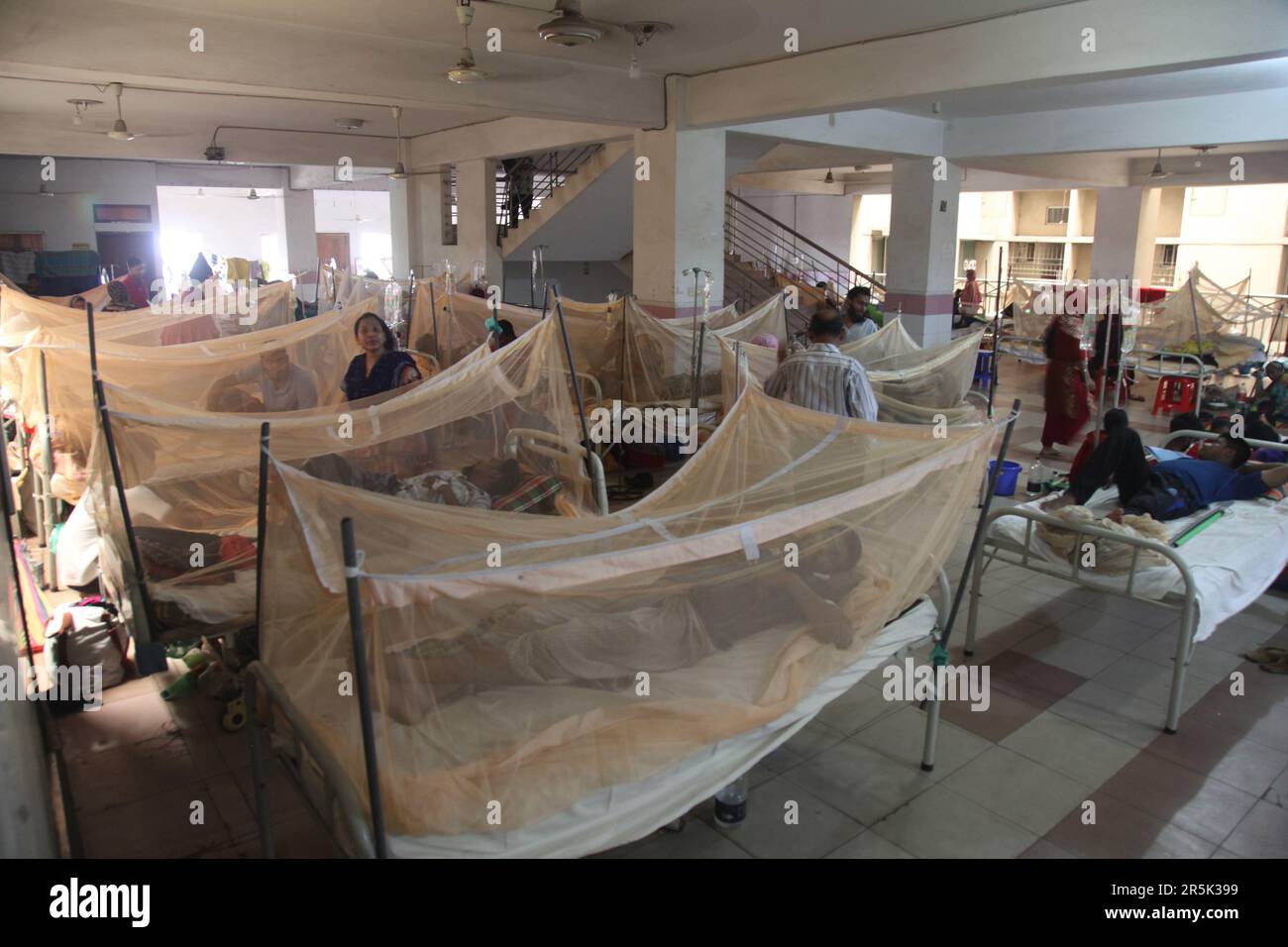 Dengue fever patients lying on the floor and on the bed outside the ...