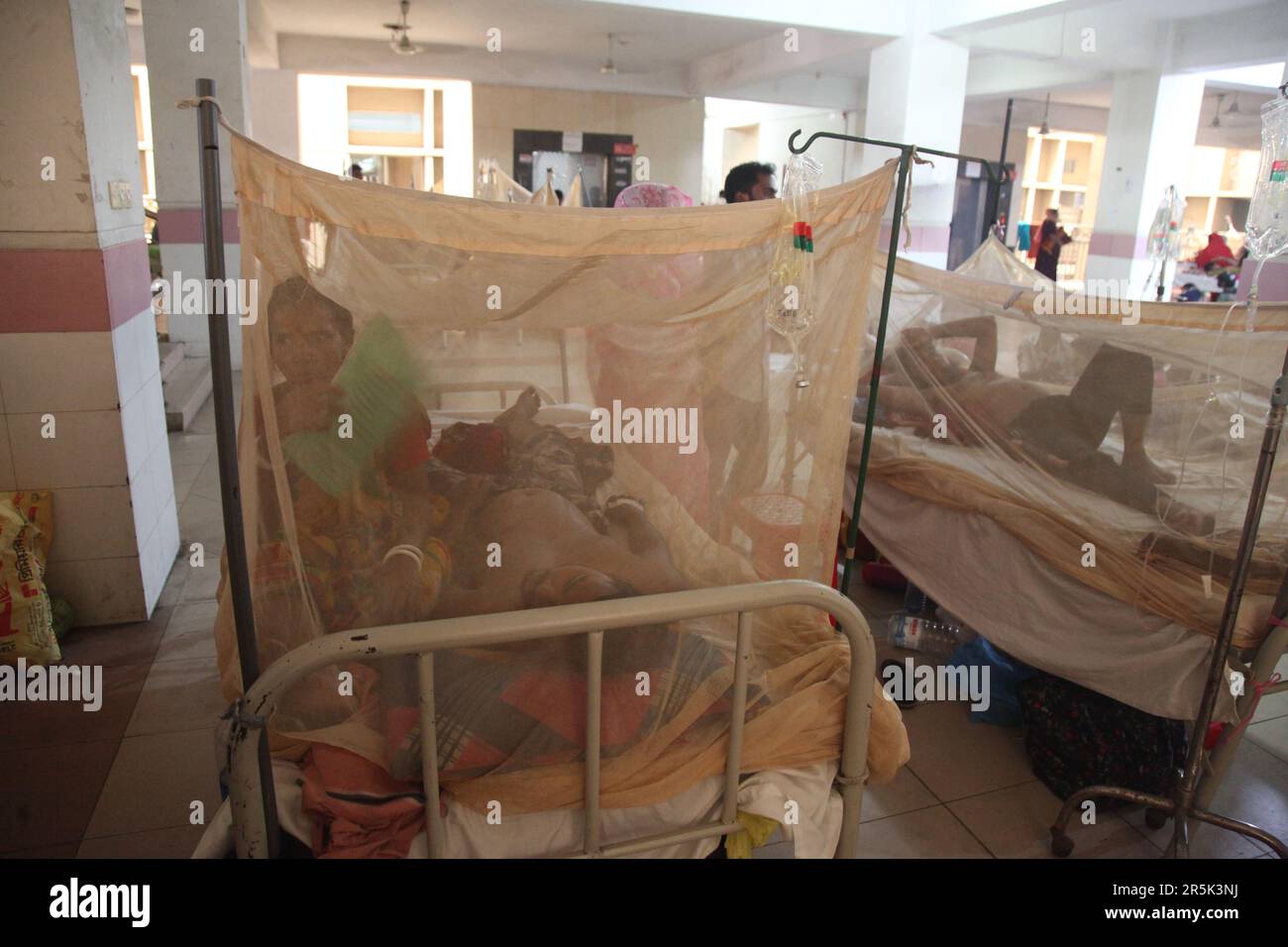 Dengue fever patients lying on the floor and on the bed outside the ...