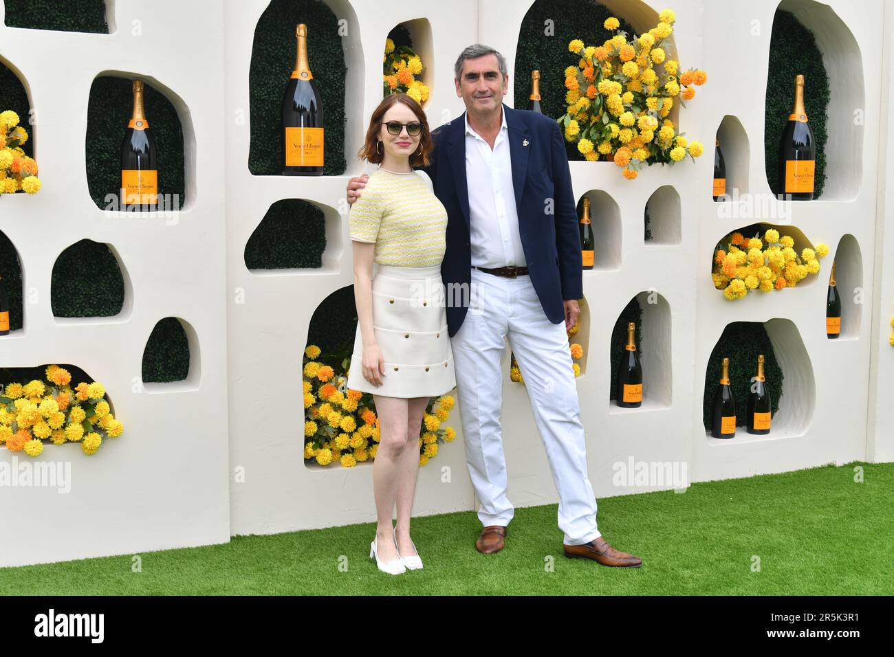 Emma Stone (L) and CEO of Veuve-Cliquot, Jean-Marc Gallot Stock Photo ...