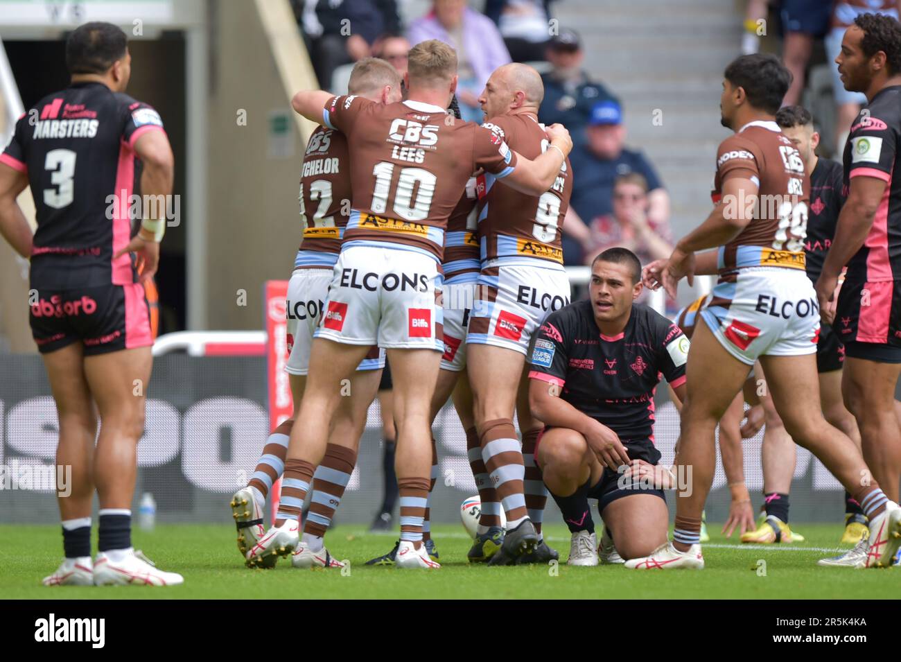 Konrad Hurrell #23 of St Helens leads the St Helens celebrations during ...