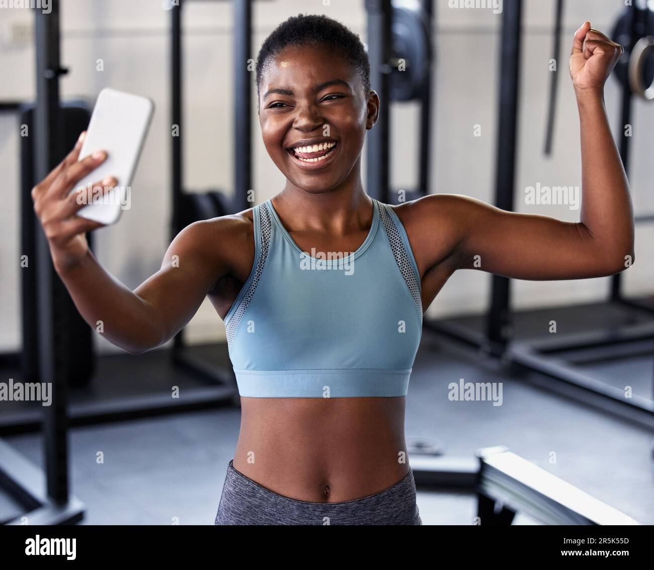 Gym, flexing or happy girl taking selfie on workout, exercise or ...