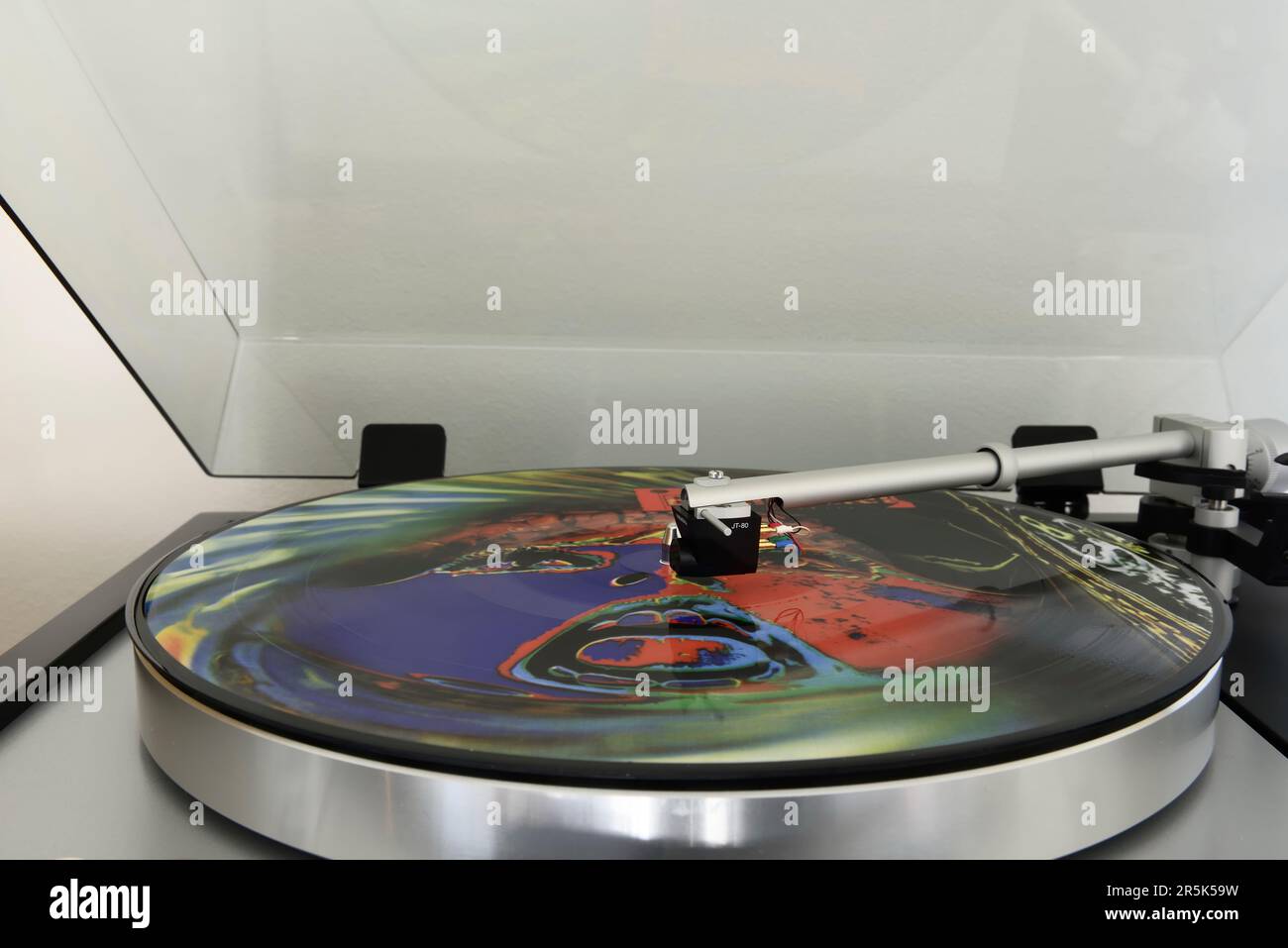 Colored vinyl on the record player Stock Photo - Alamy