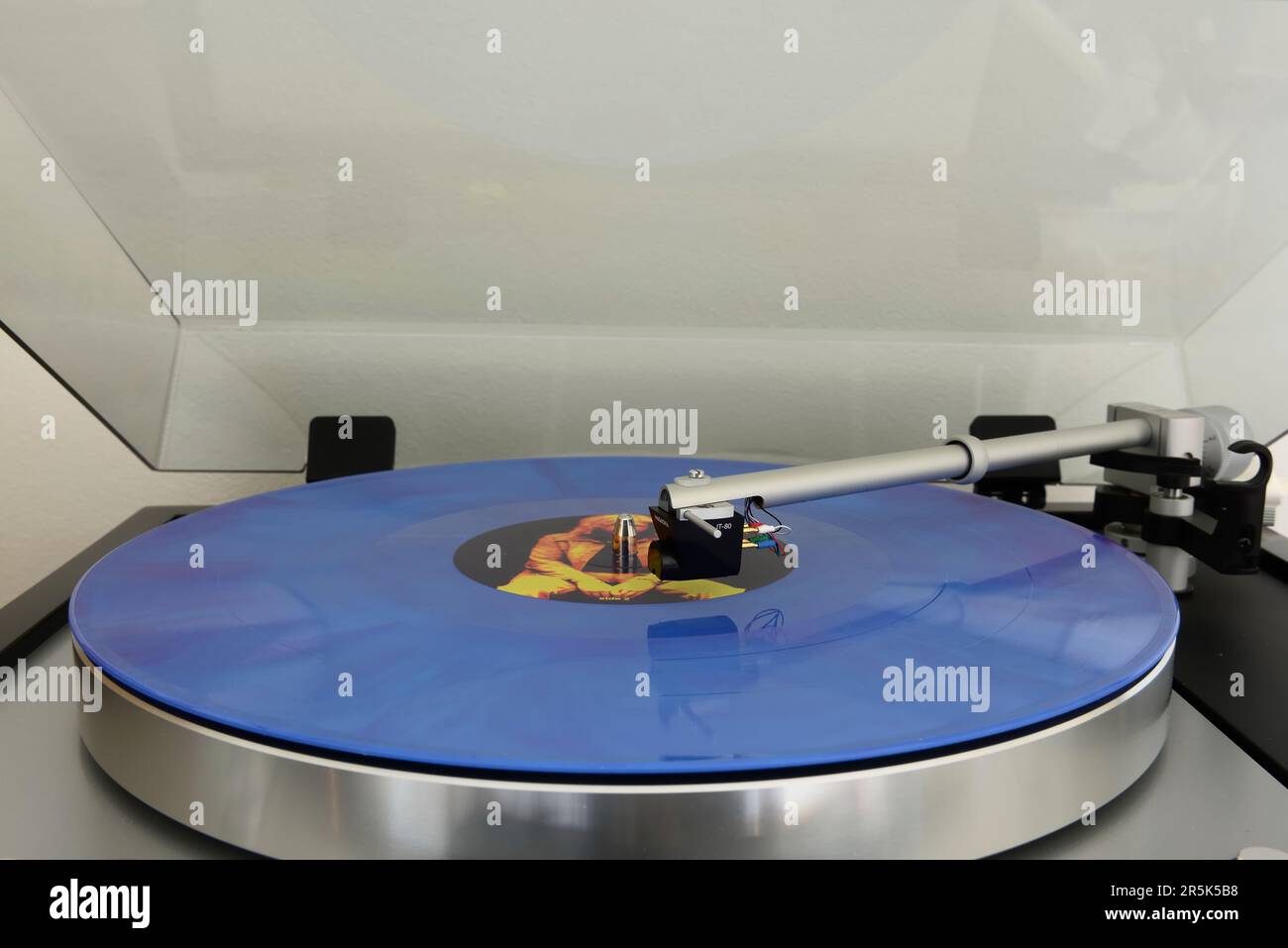 Colored vinyl on the record player Stock Photo - Alamy