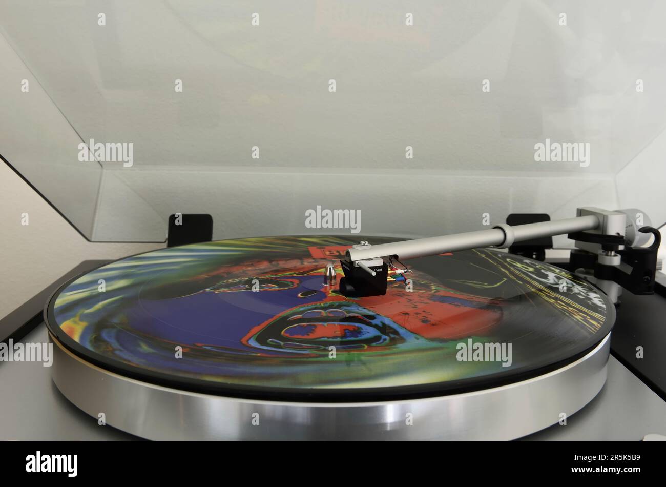 Colored vinyl on the record player Stock Photo - Alamy