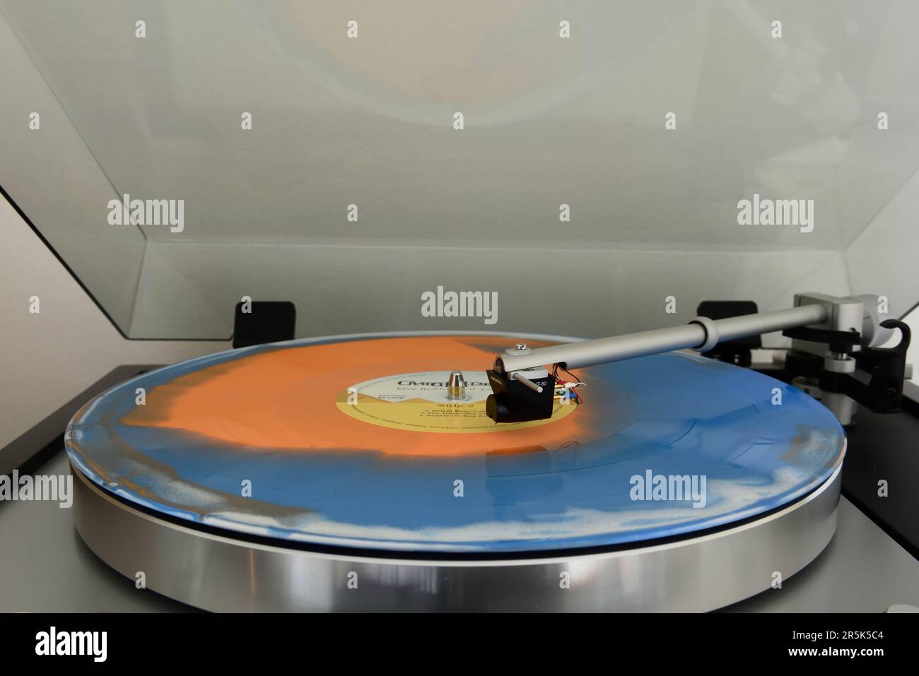 Colored vinyl on the record player Stock Photo - Alamy