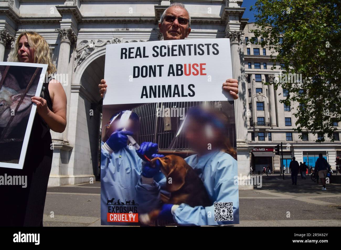 London, UK. 4th June 2023. Activists holding pictures of animals and ...
