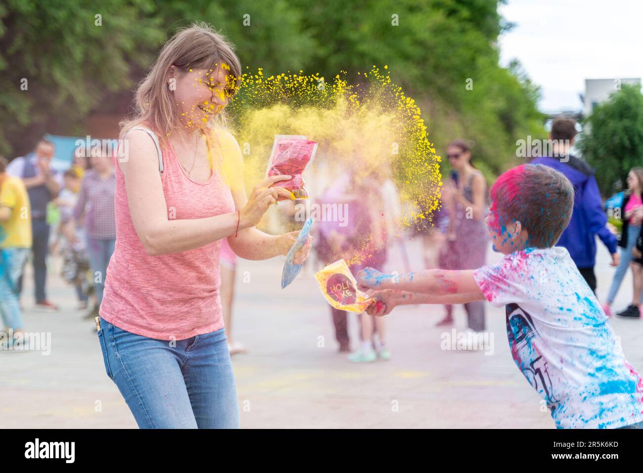 Vladivostok, Russia. 4th June, 2023. People throw colored powder to ...
