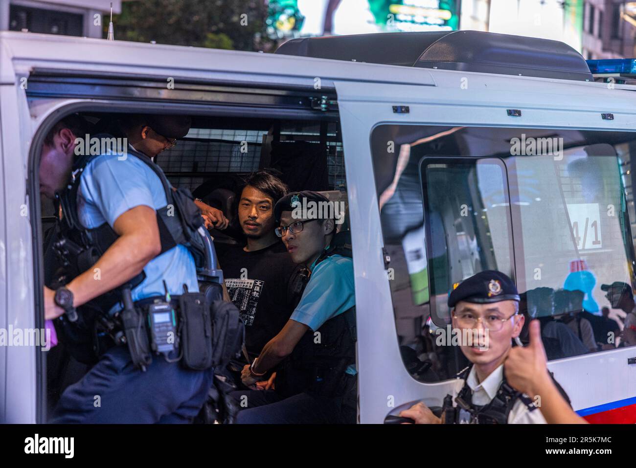 Activist Leo Tang is taken away by police near Victoria Park, the city ...