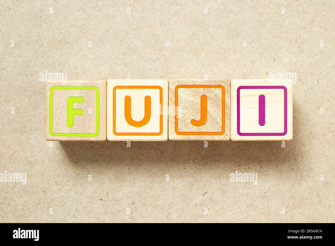 Wooden alphabet letter block in word fuji on wood background Stock ...
