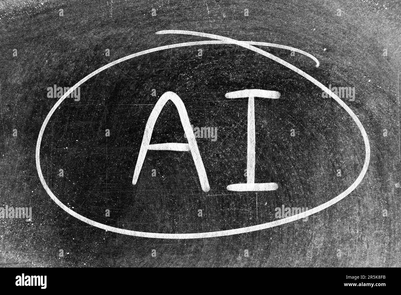 White chalk hand writing in word AI (Abbreviation of artificial ...