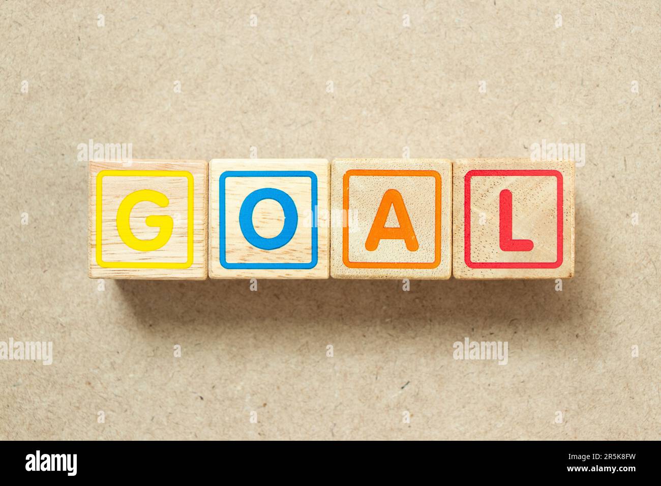 Wooden alphabet letter block in word goal on wood background Stock ...
