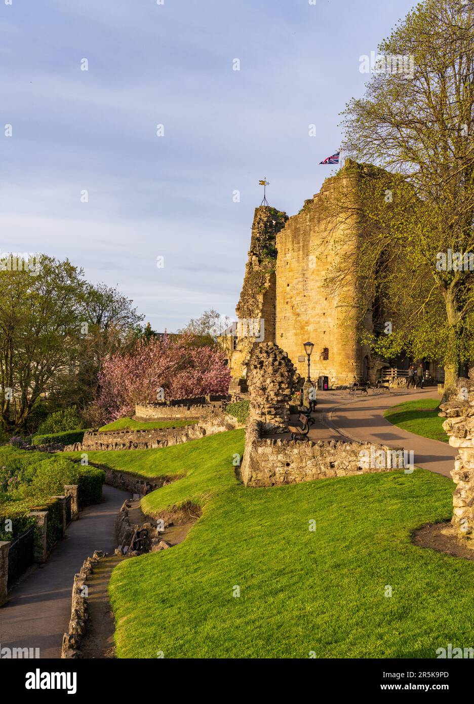 Ancient stone castle walls with keep overlooking river in Knaresborough ...