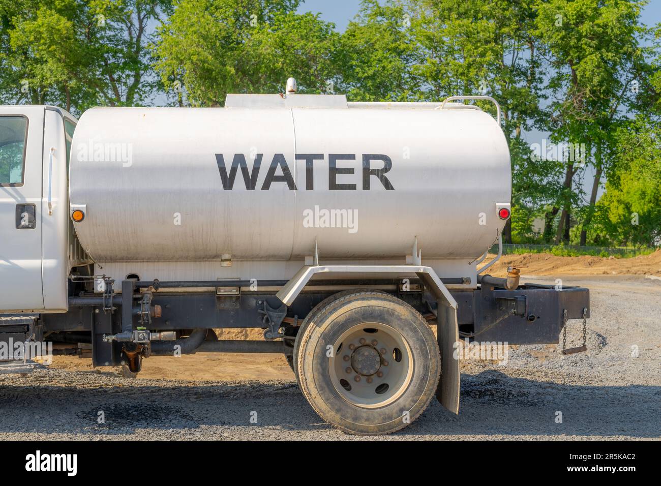 Water truck on the construction site to address blowing dust Stock ...