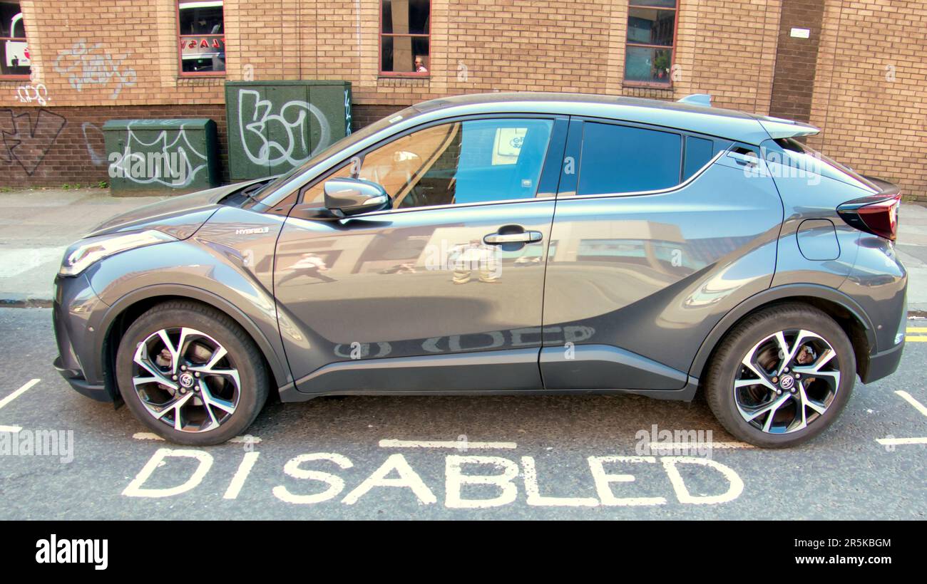 disabled car parking space with car Stock Photo - Alamy