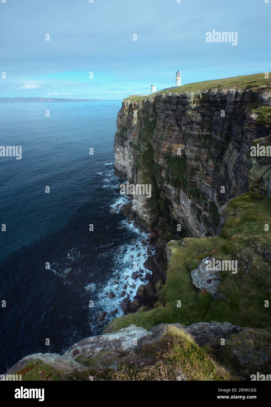 Magnificent scenery of the sea bay and the lighthouse on the cliff ...