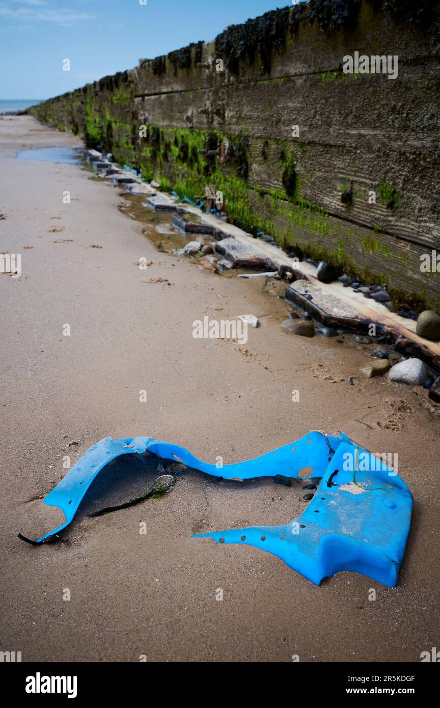 Blue plastic pollution on a beach Stock Photo - Alamy