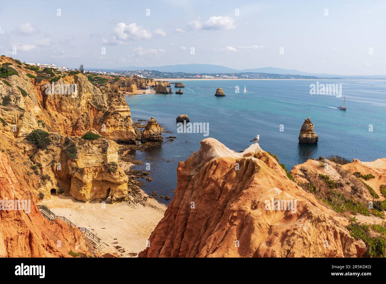 Playa do Camilo beach between the cliffs near the city of Lagos,Algarve ...