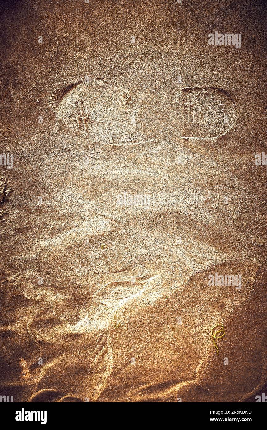 Boot marks in sand Stock Photo - Alamy