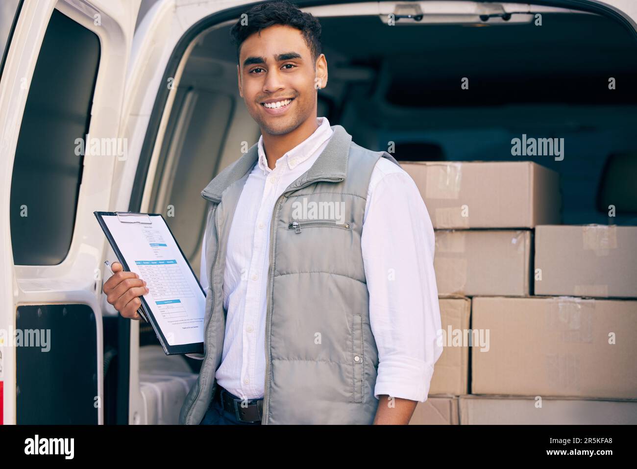 Delivery man, box and working with a checklist in the van, courier ...