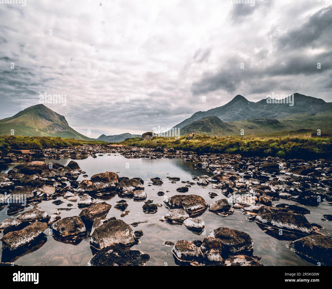 A panoramic vista unfolds, revealing the majestic mountain peaks of the ...