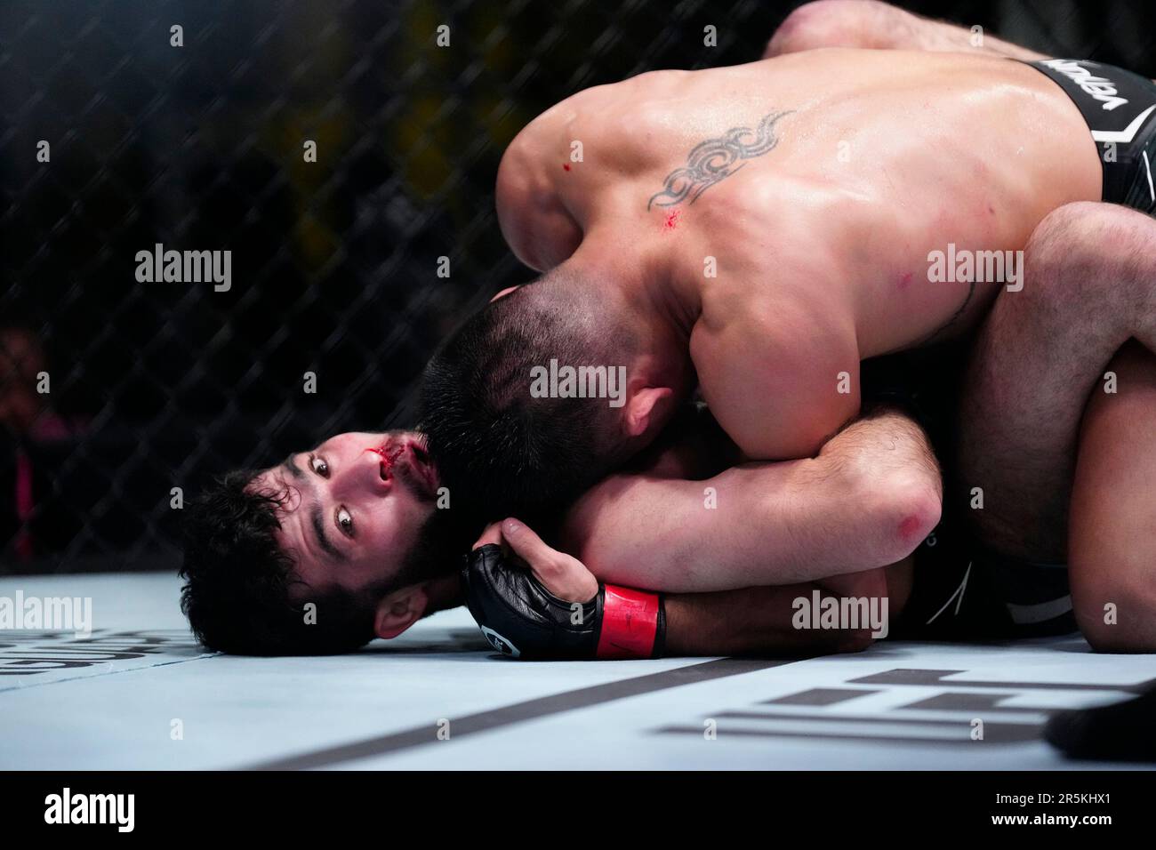LAS VEGAS, NV - JUNE 03: John Castaneda and Muin Gafurov competes in a ...