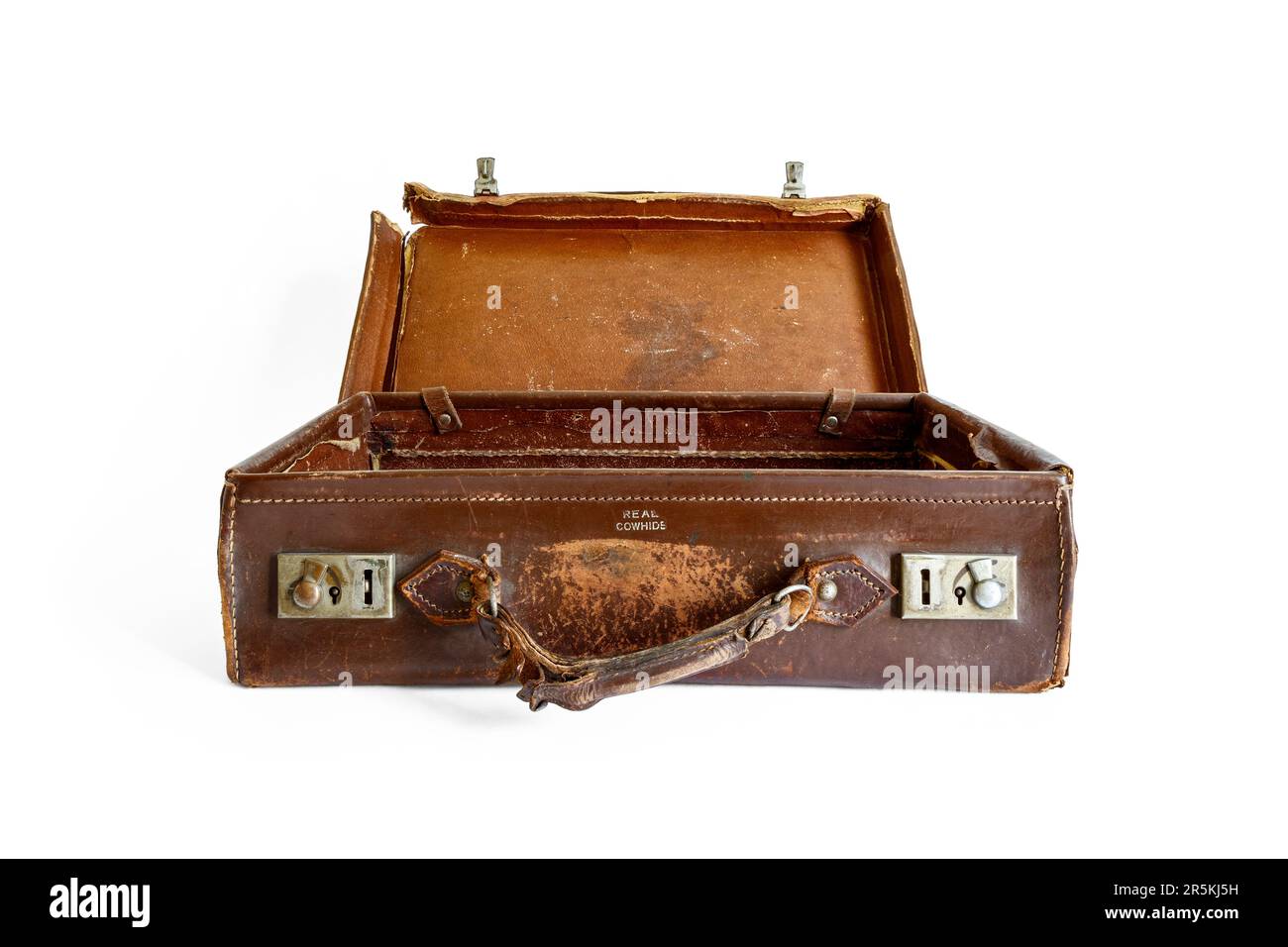 An old battered brown leather suitcase, isolated on a white background ...