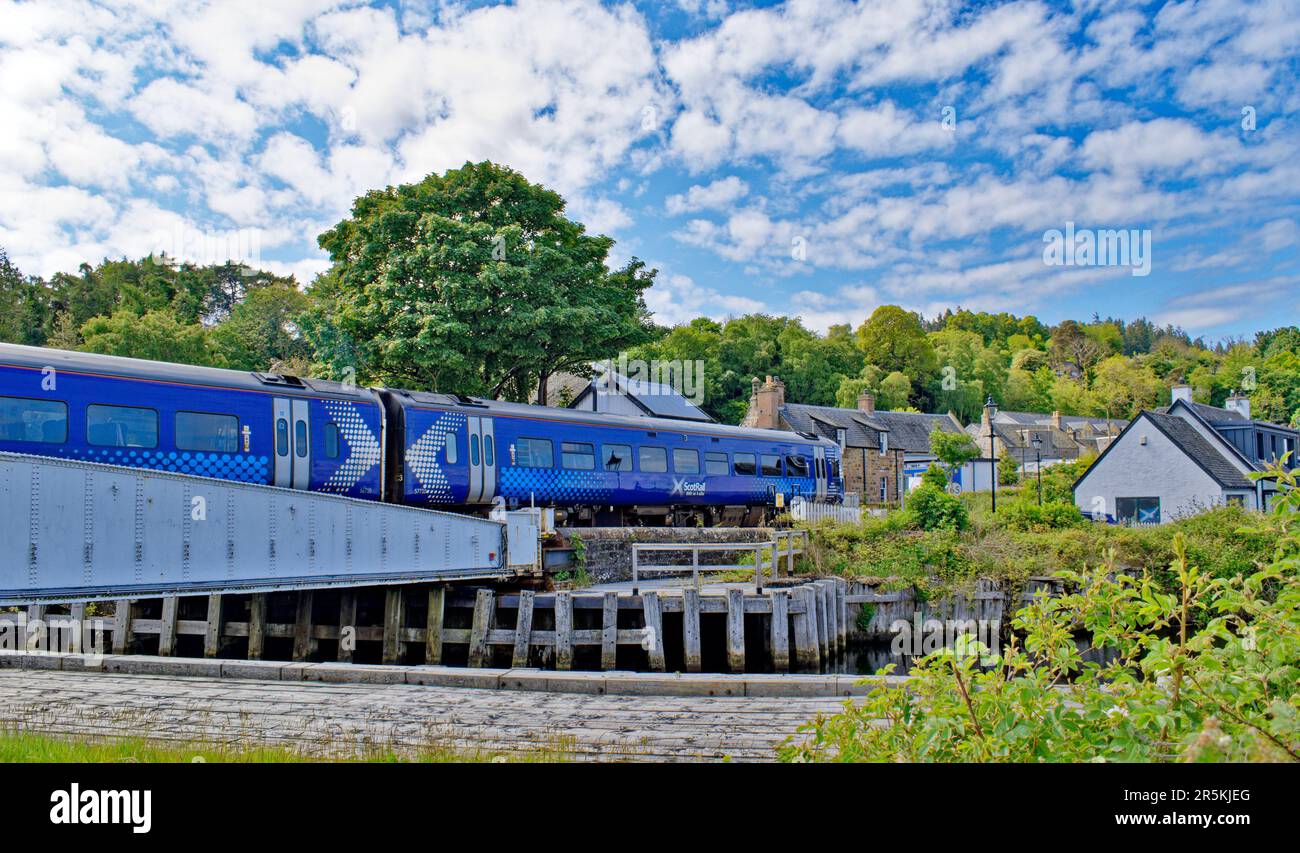 Inverness Scotland a blue ScotRail train crossing the Clachnaharry ...
