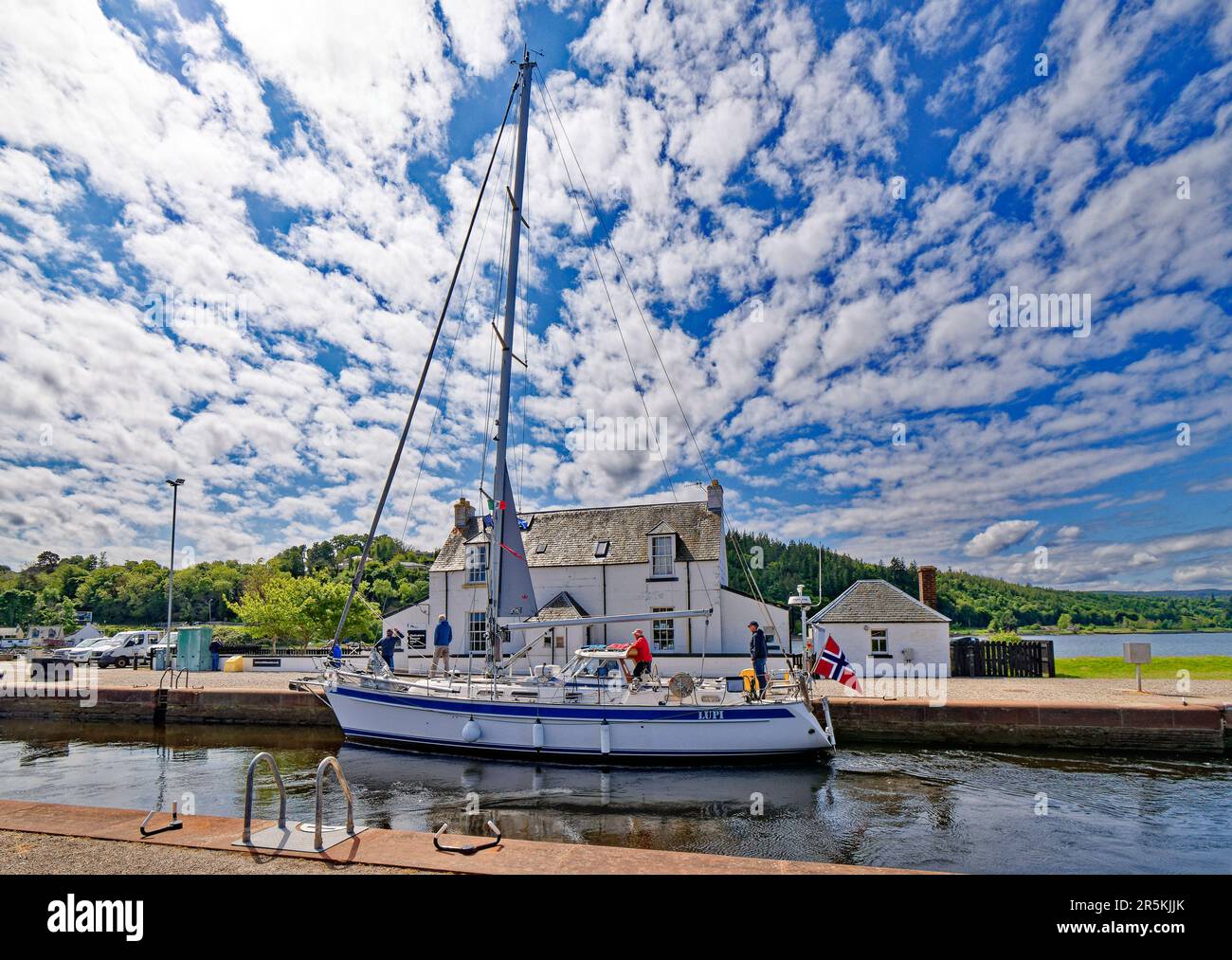 Inverness Scotland blue sky and a yacht in early summer waiting in the ...