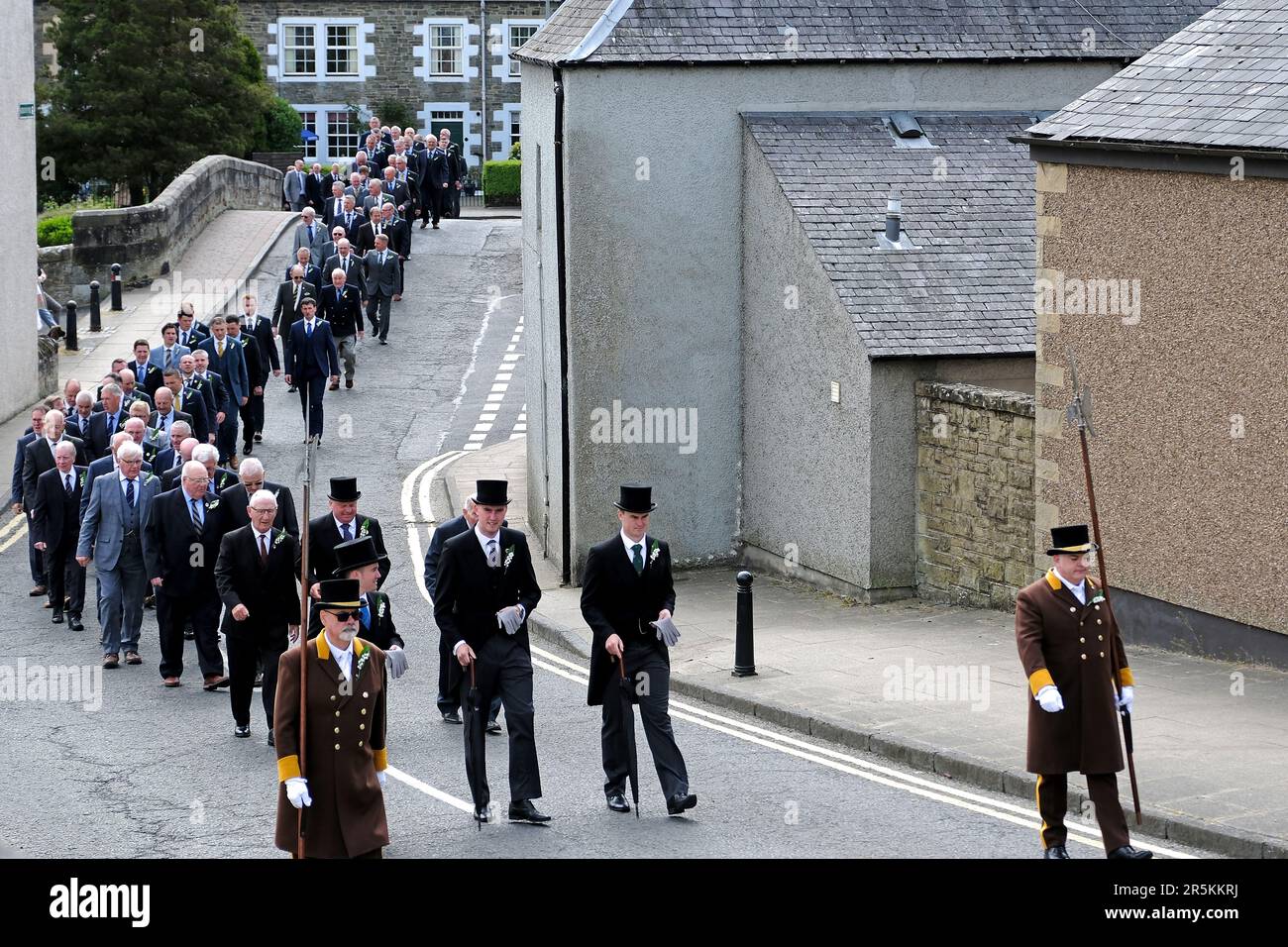Hawick, UK. 04th June, 2023. Kirkin Ô the Cornet Halberdiers flank the ...