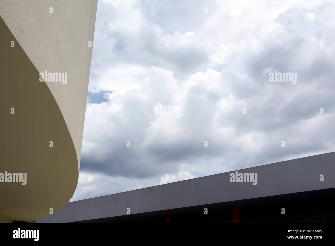 building and architectural detail - curved and straight shapes between ...