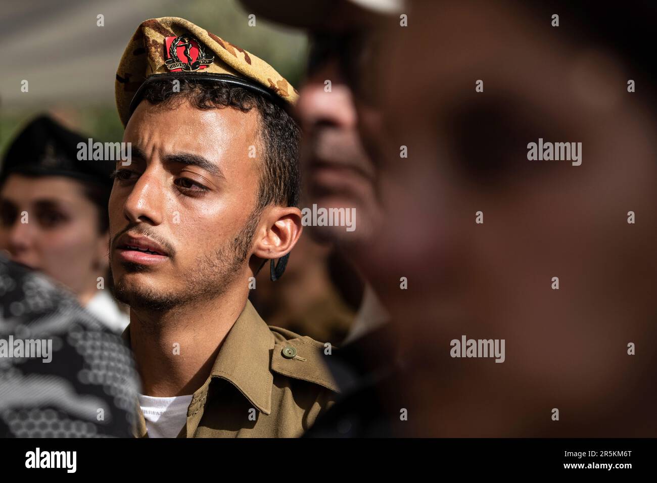 An Israeli soldier attends the funeral of Israeli army Staff Sgt. Ohad Dahan, in Ofakim, Israel ...