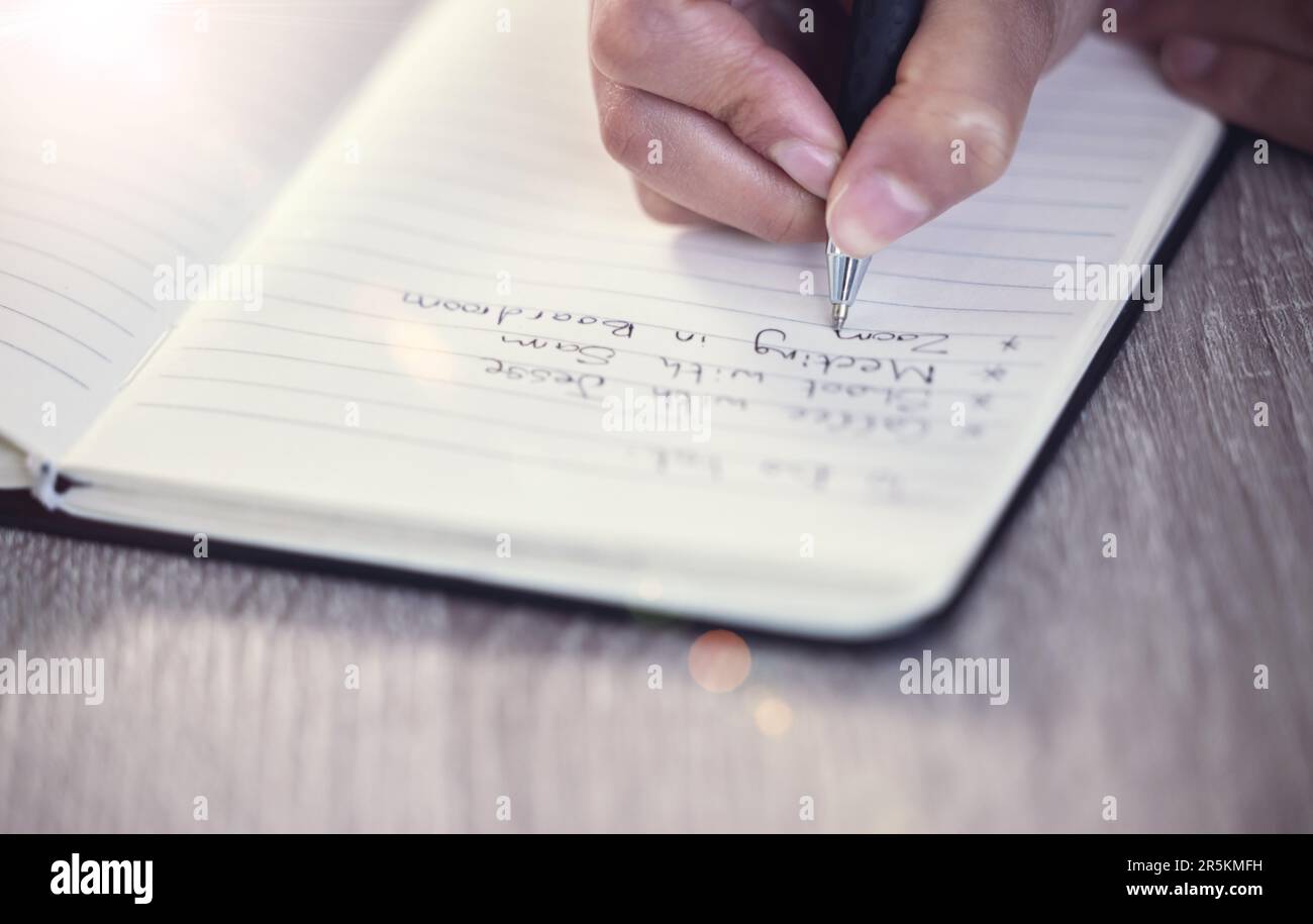 Hands, notebook and writing notes, planning and schedule in office ...