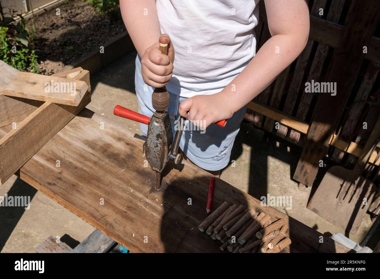 Making wooden insect house decorative bug hotel Stock Photo - Alamy