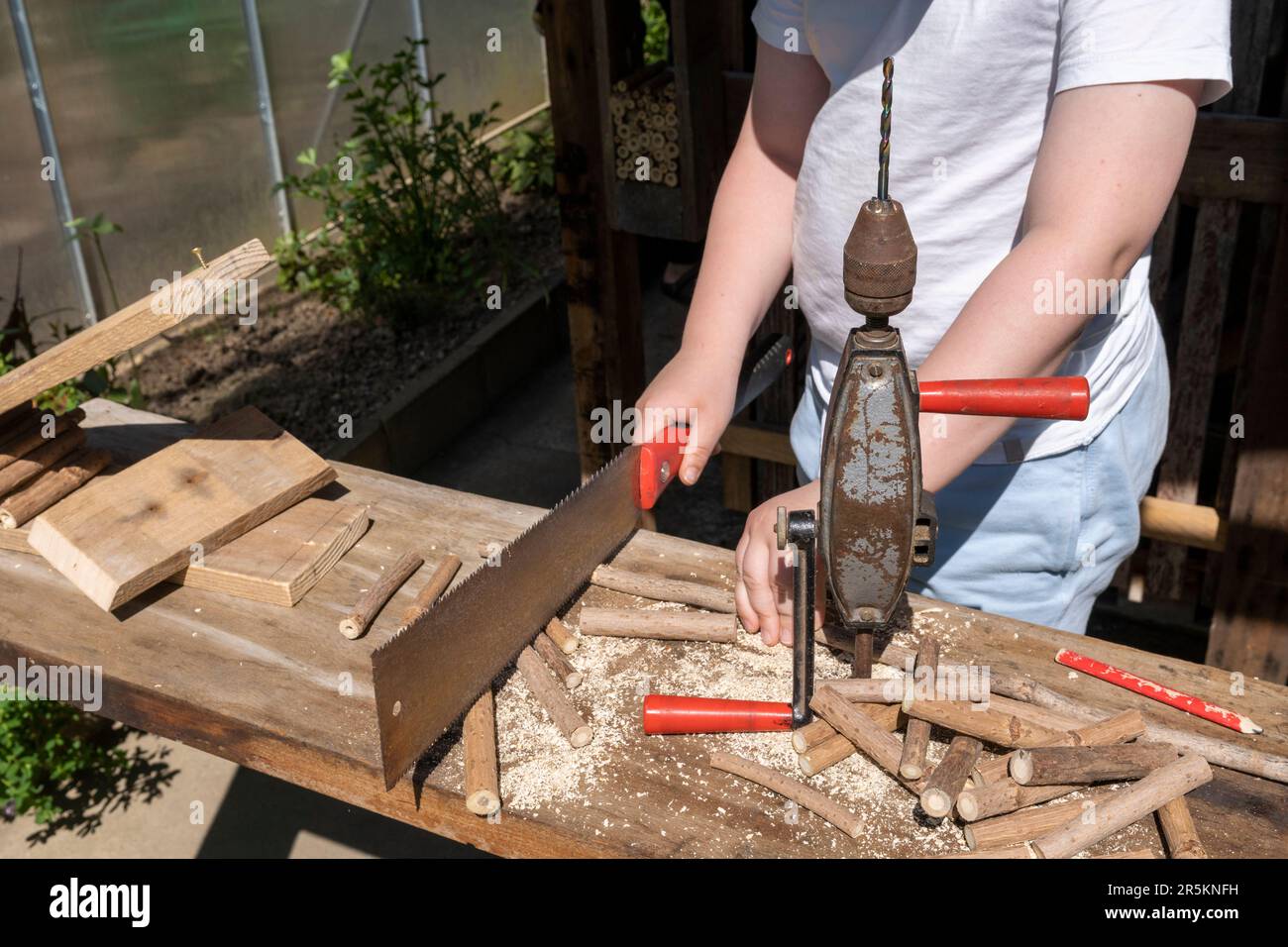 Making wooden insect house decorative bug hotel Stock Photo - Alamy