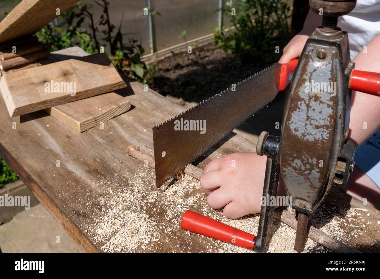 Making wooden insect house decorative bug hotel Stock Photo - Alamy