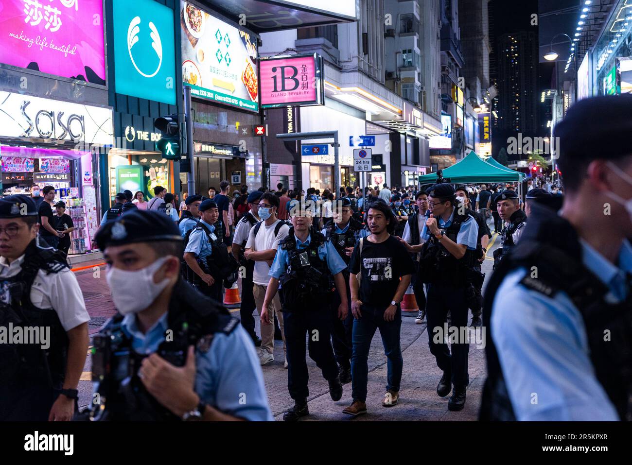 Activist Leo Tang is taken away by police near Victoria Park, the city ...