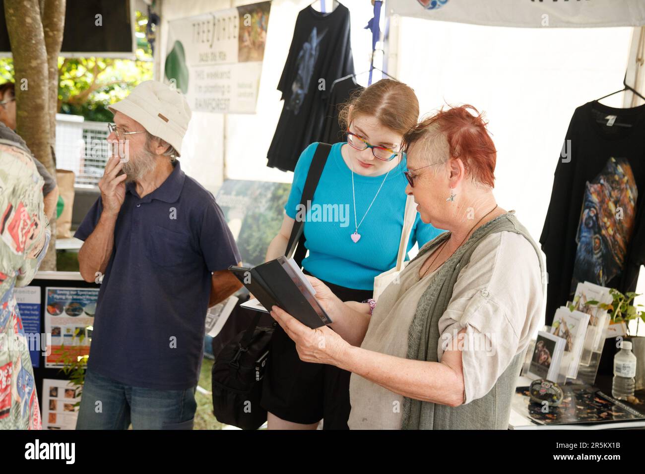 Maree of the Bats & Trees Society of Cairns speaks with members of the ...