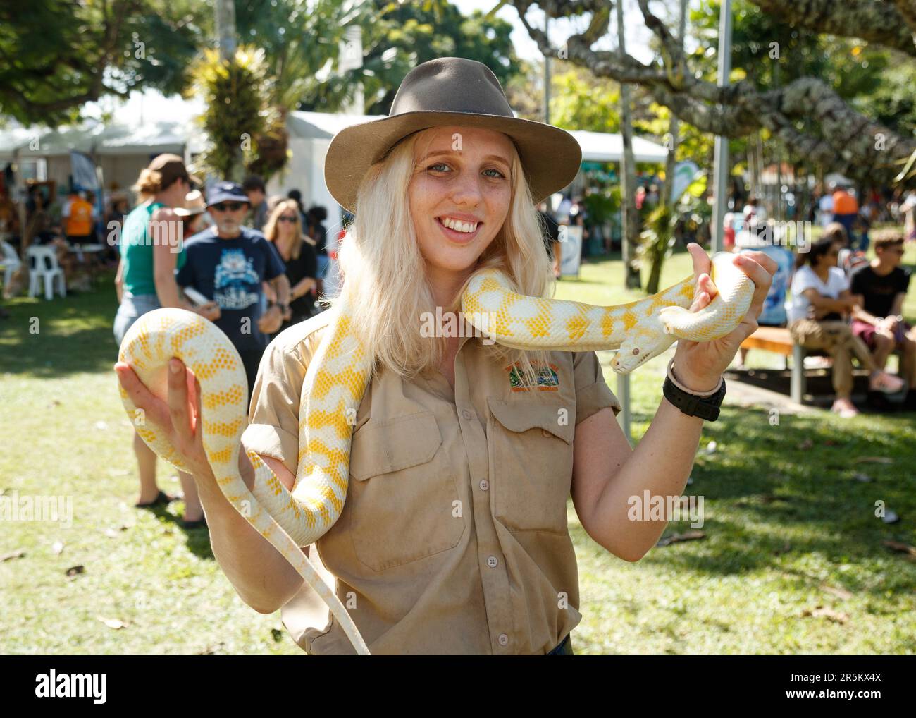 A staff member from Hartley's Crocodile Adventures holds an albino ...