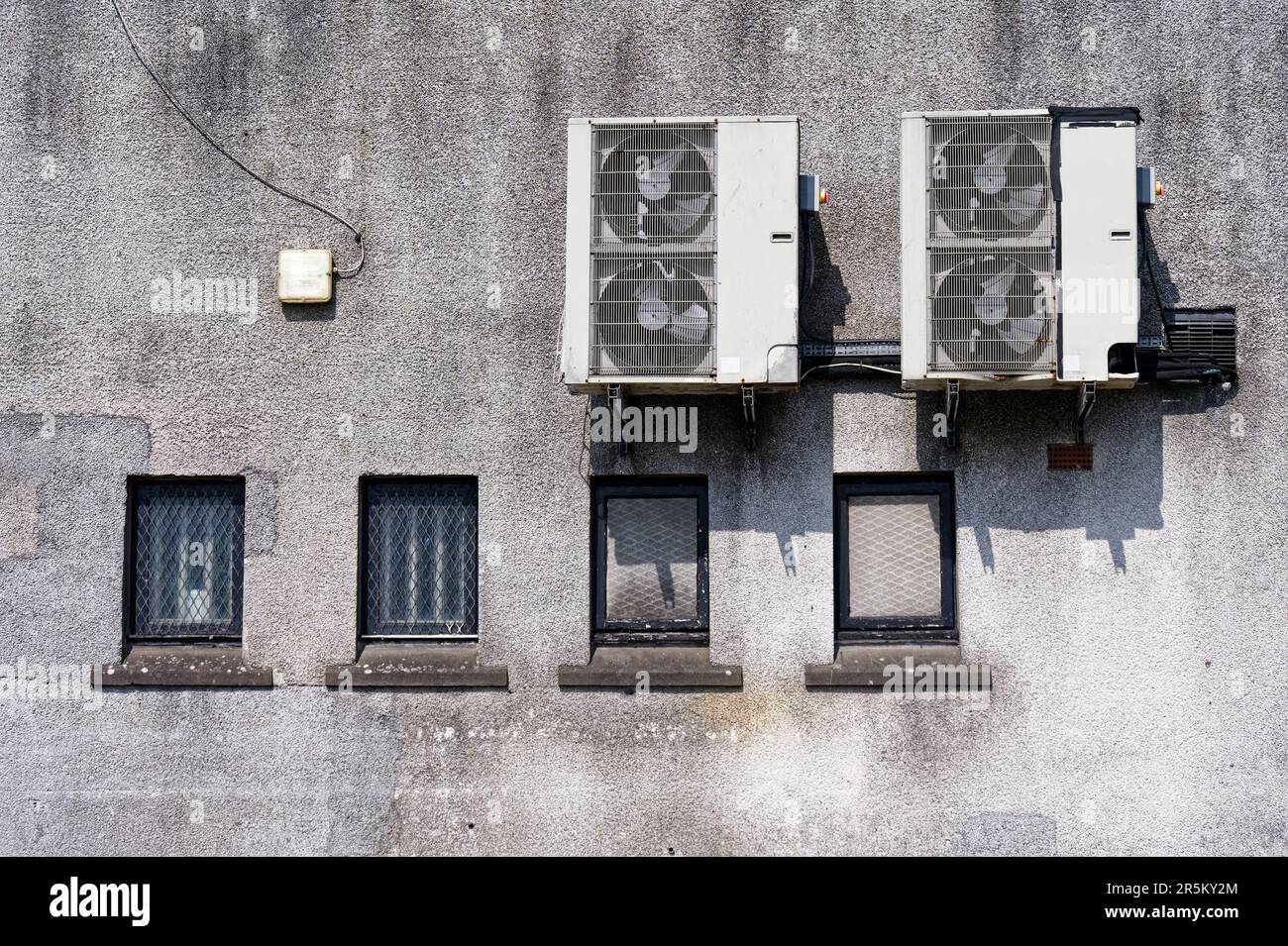 Heat pump condenser units for heating and cooling modern building Stock ...