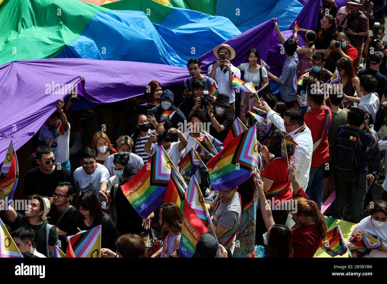 Bangkok, Thailand. 4th June, 2023. Demonstrators hold rainbow flags ...