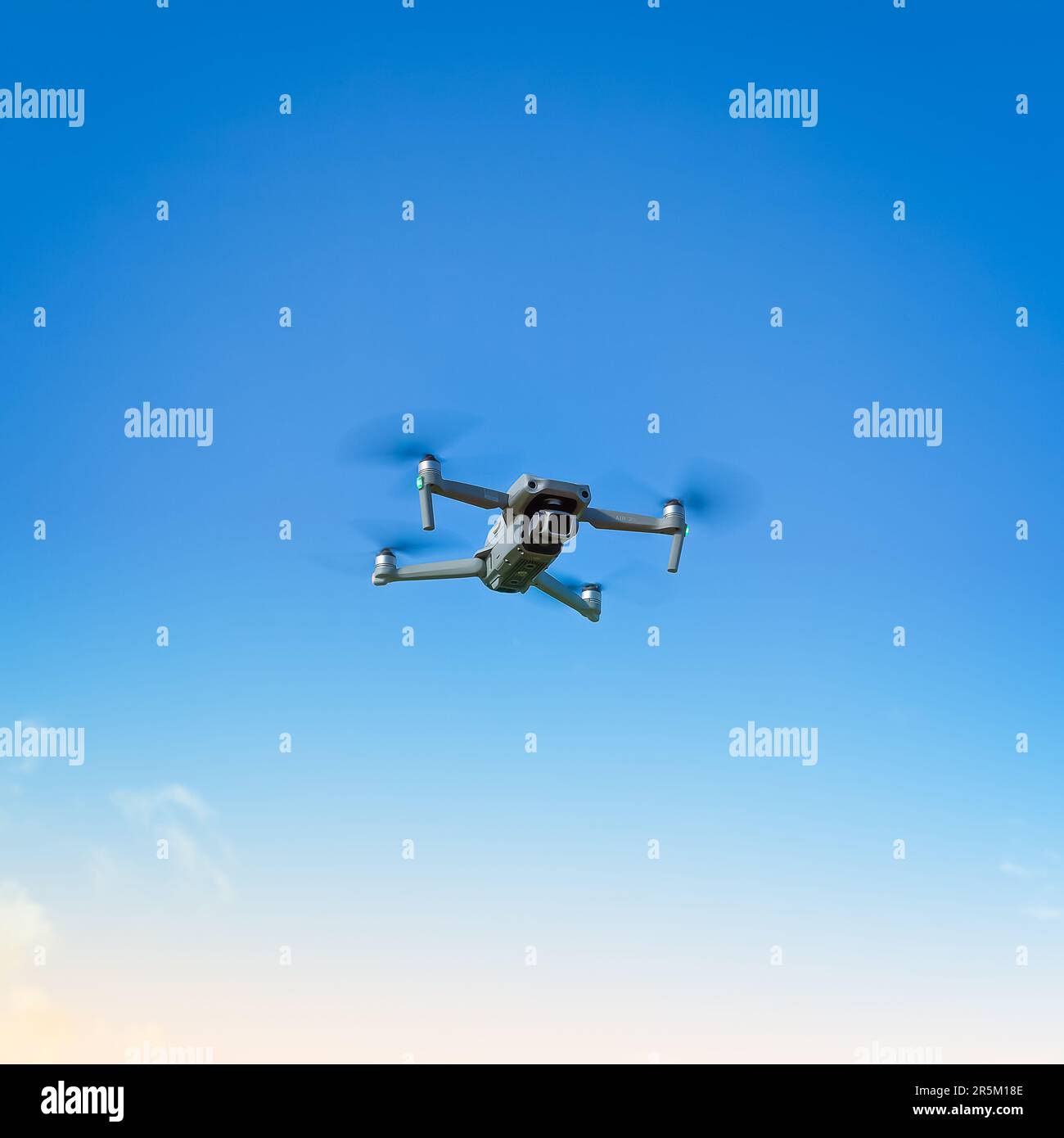 drone DJI air 2S in the sky, front view, close-up, blue sky Stock Photo ...