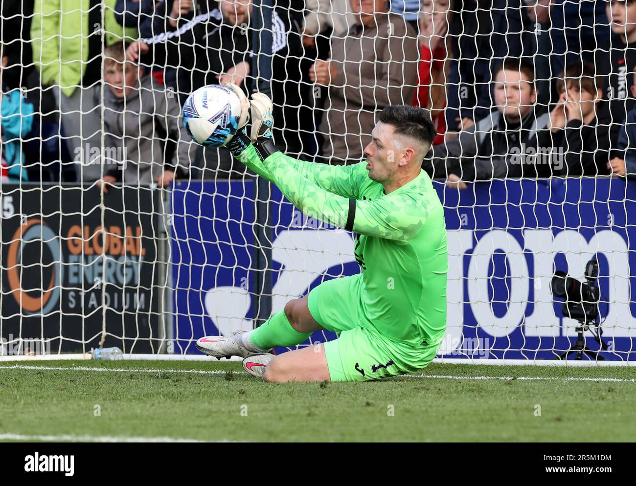 Ross County goalkeeper Ross Laidlaw saves a penalty from Partick ...