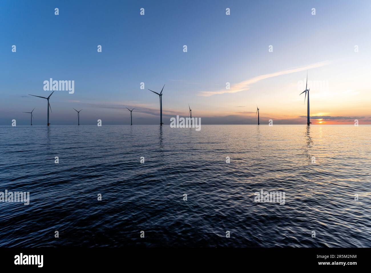 offshore wind farm at sunset Stock Photo - Alamy