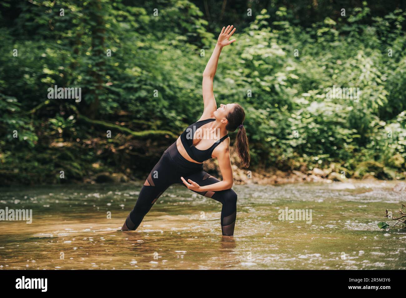 Woman relaxing river barefoot hi-res stock photography and images - Alamy